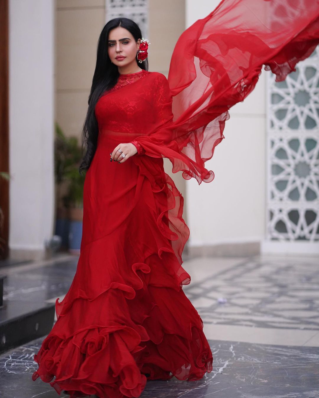Dolly Jaw-Dropping Pictures in a Hot Red Flared Dress