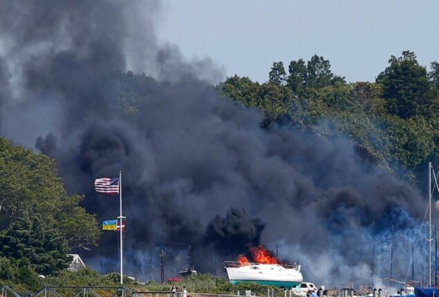 Buildings and vehicles burn in Massachusetts marina fire