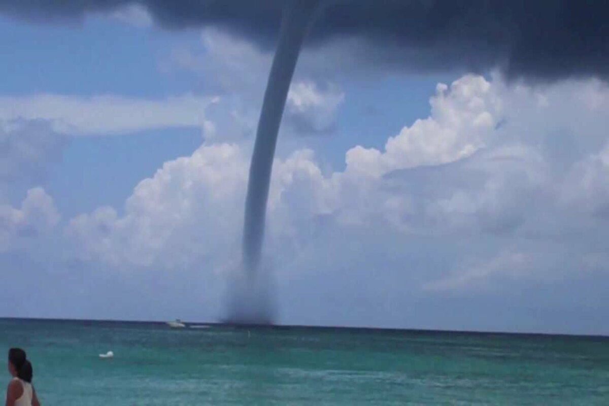 Terrifying waterspout slams into the ground during storm