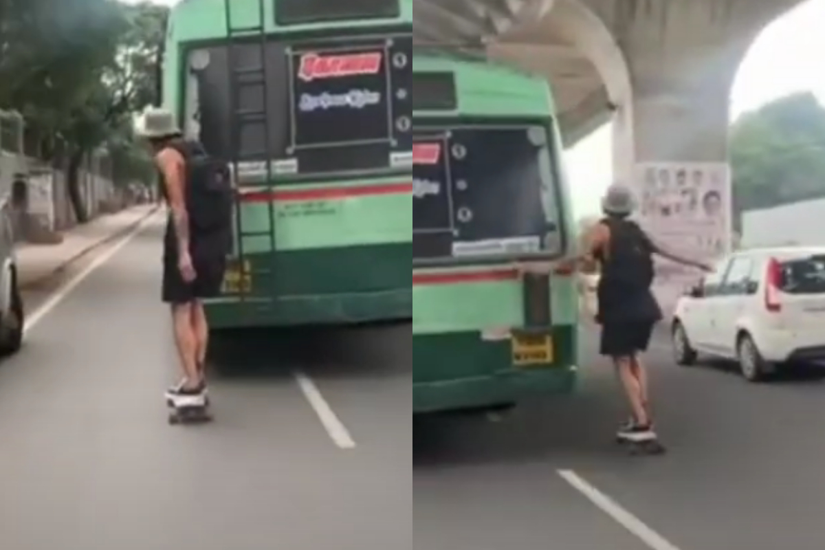 Stranger holds speeding bus while skating on road goes viral